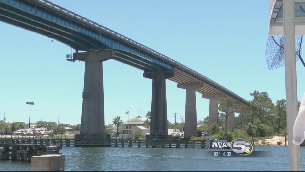 Woman Rescued After Falling Off Bridge - YouTube