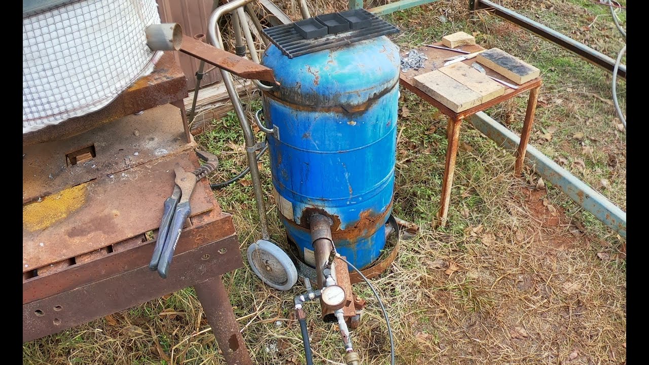 Melting Scrap Aluminum in the Blue Furnace Lots of Pouring Action - YouTube
