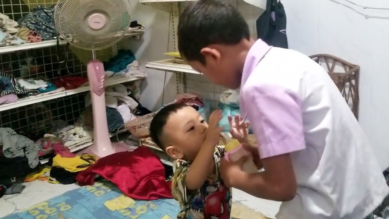 Good older Brother take care his brother - YouTube