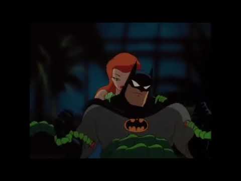 Poison Ivy smothers Batman with kisses