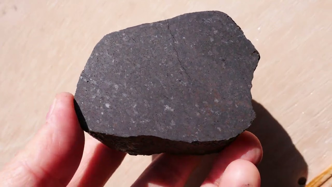 4K Meteorite NWA 11639 Ureilite in sunlight - YouTube