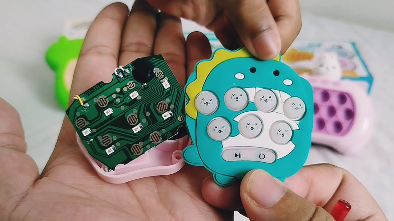 o que tem dentro de um Mini Pop it Eletrônico ? - YouTube