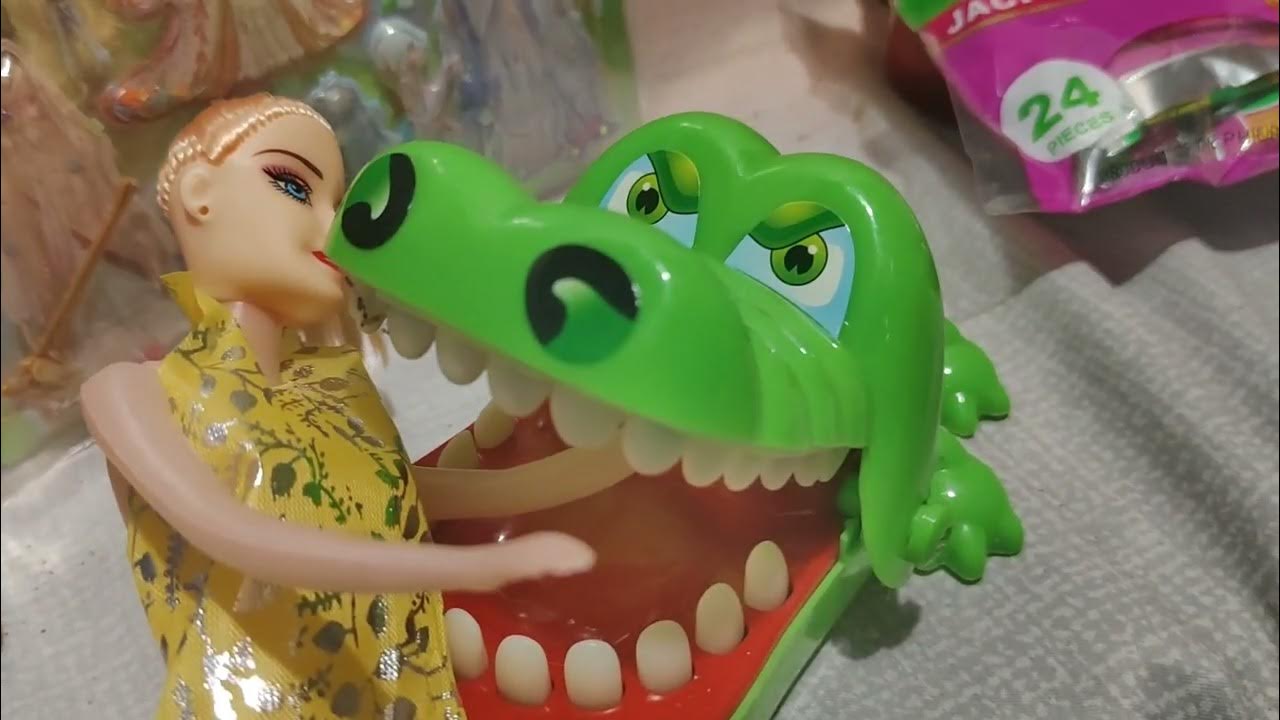 croc loves barbie! he said she is mine!!! - YouTube