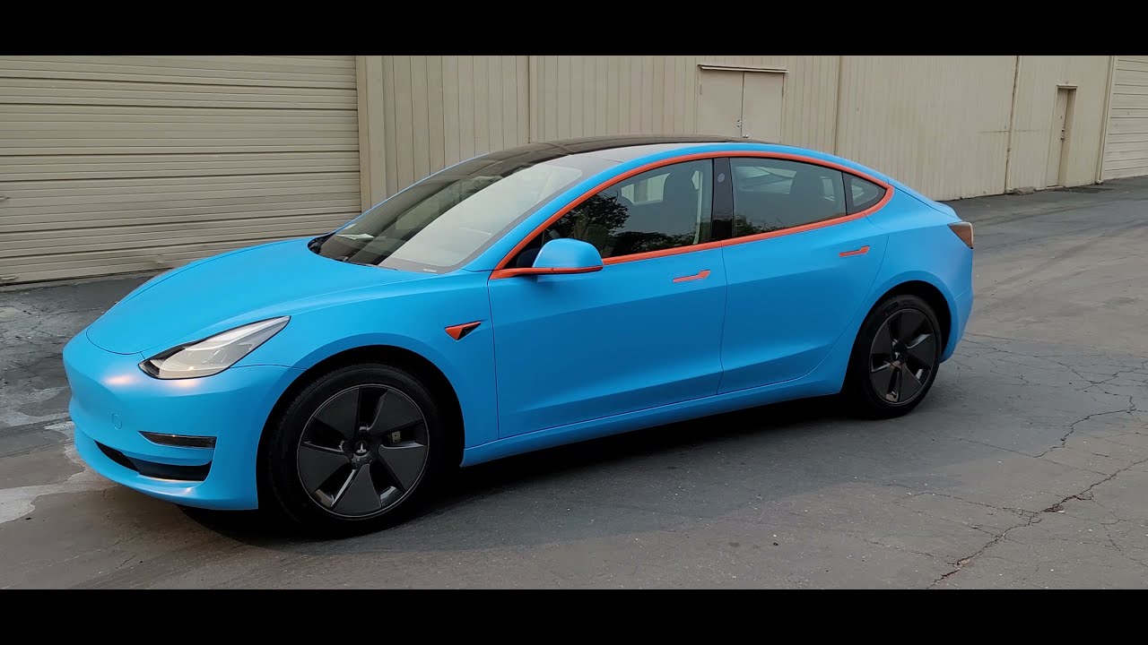 Tesla Model 3 wrapped in Satin light Blue with gloss orange trim - YouTube