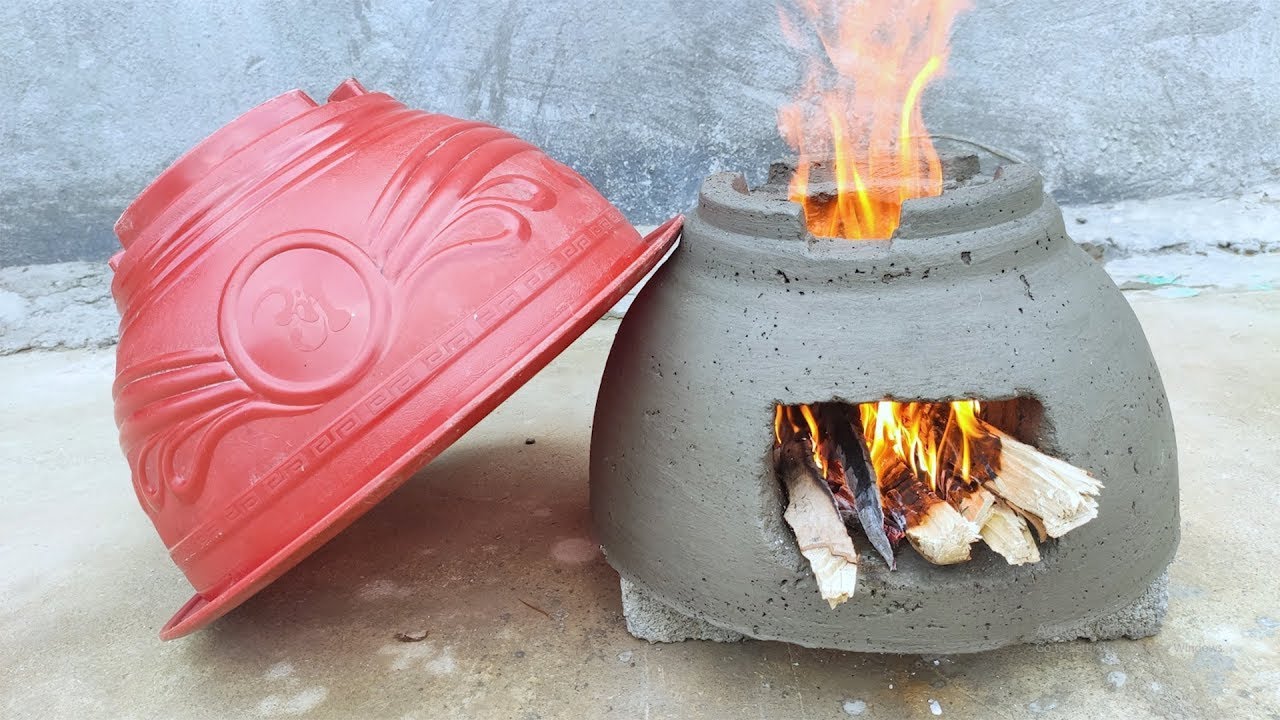 How to make firewood stove / Cast a wood stove with an old flower pots ...