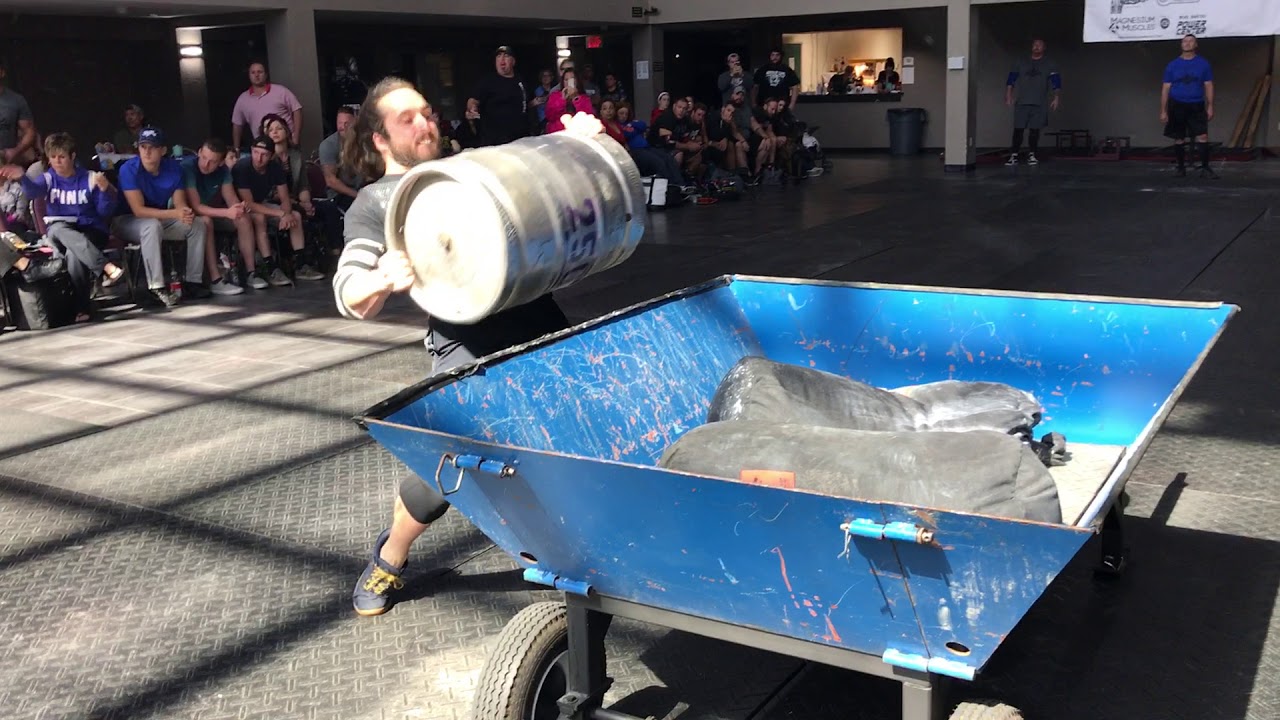 Sandbag + Keg Loading Wheelbarrow Race - YouTube