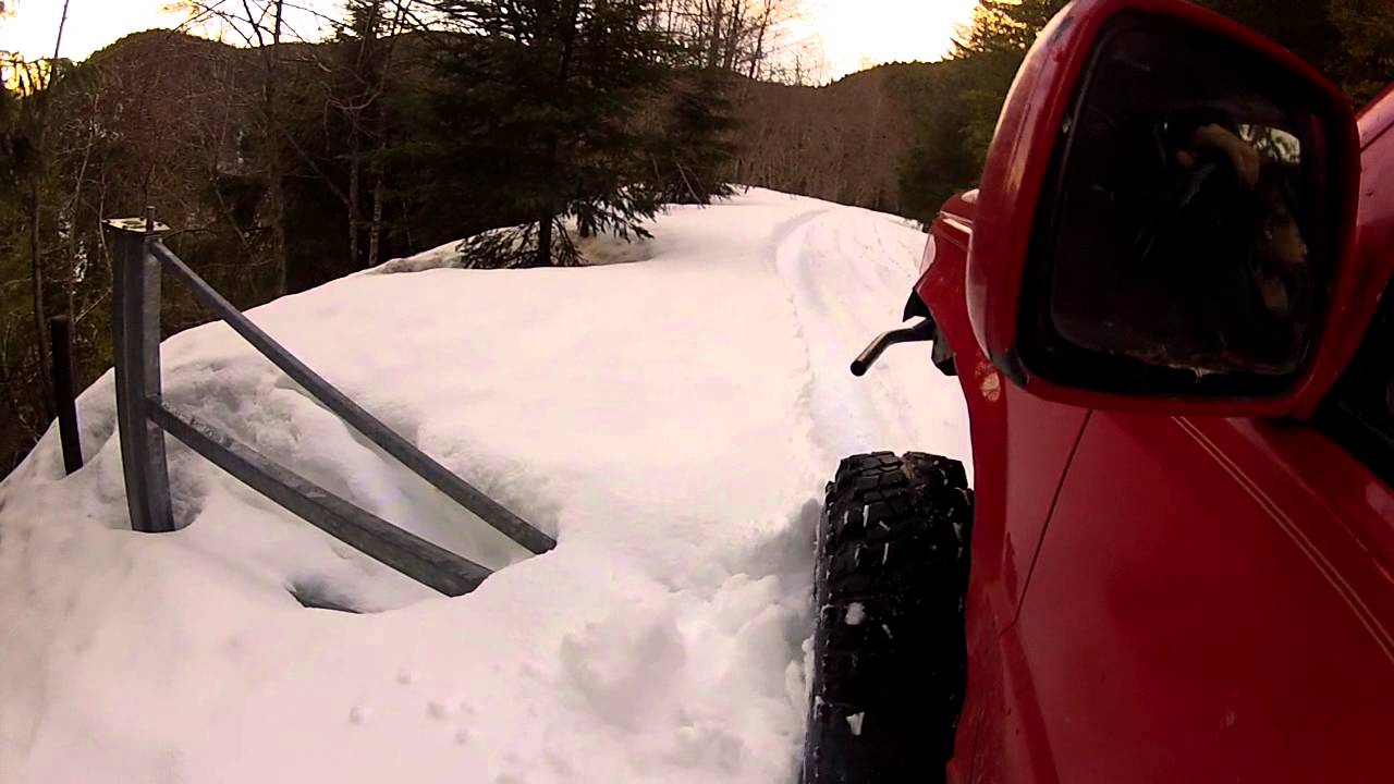 Driving over snow covered gate - YouTube