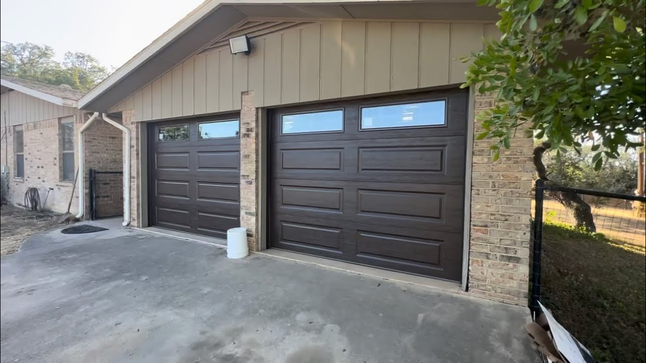 Here’s our Clopay Classic Long Panel in Chocolate color, with clear ...