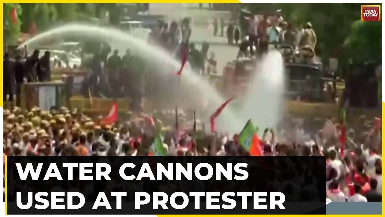 Dramatic Protest On Camera: Water Cannons Used As BJP Protests Against ...