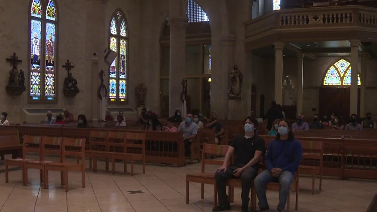 Local families take part in first Catholic mass service since pandemic ...