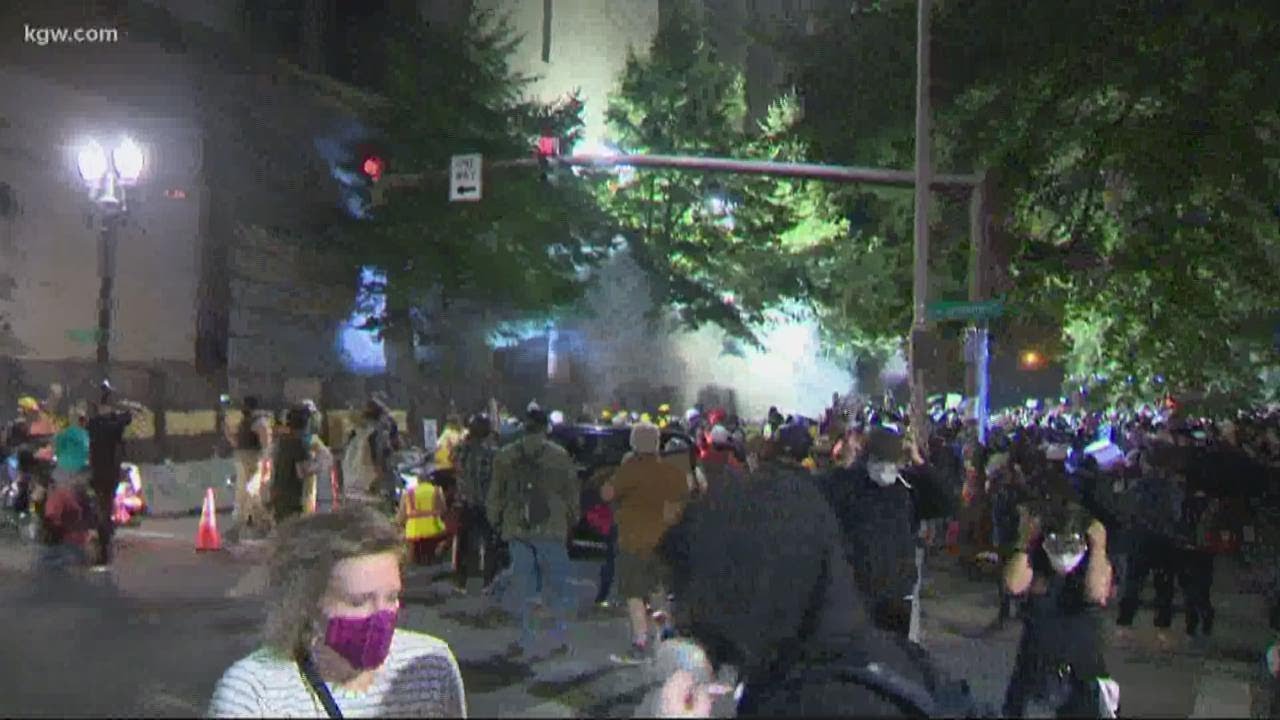 Portland protesters pushed away from courthouse by federal officers ...