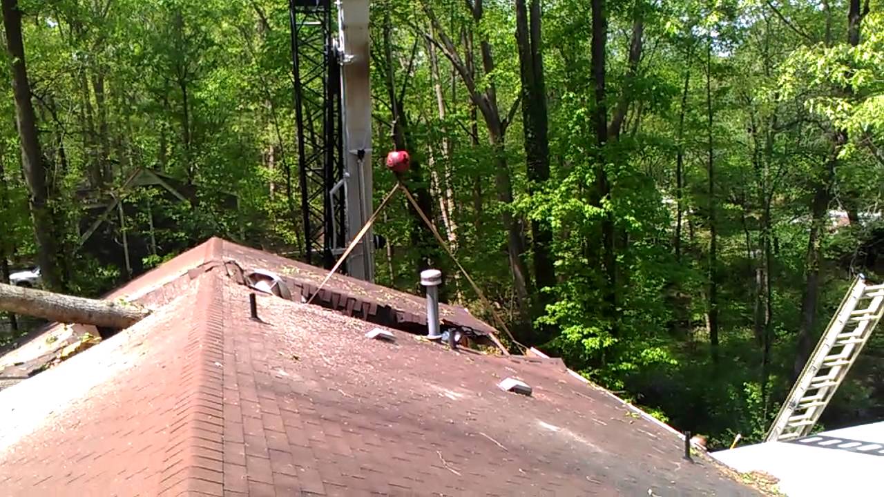 Crane Removing Fallen Tree from House - YouTube