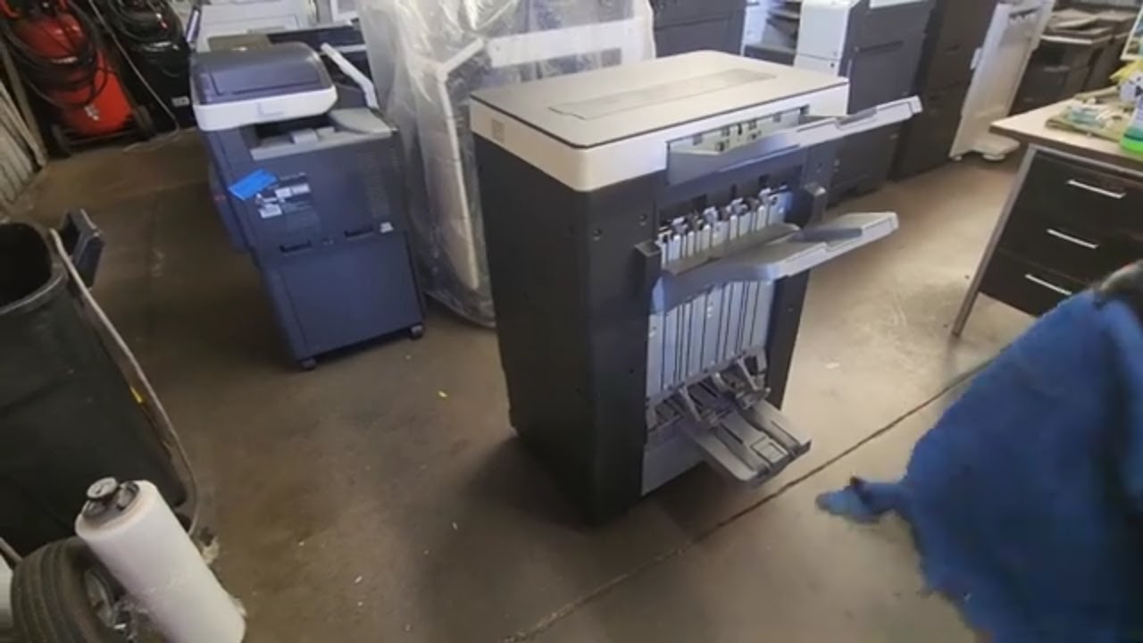 How to install trays on a Konica Minolta FS 535 Saddle Stitch Finisher ...