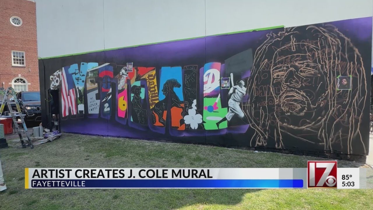 NY artist creates mural of J. Cole in Downtown Fayetteville - YouTube
