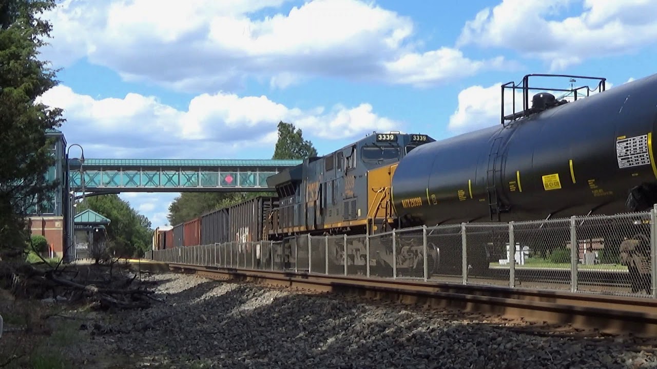 CSX Q410-30 with Canadian Pacific, SD70MAC and a pink breast cancer boxcar - YouTube