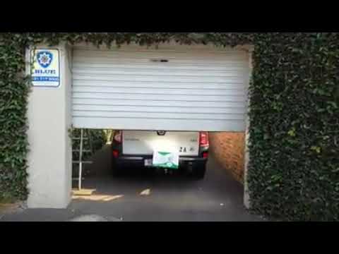 Centurion RDO single roll up garage door. - YouTube