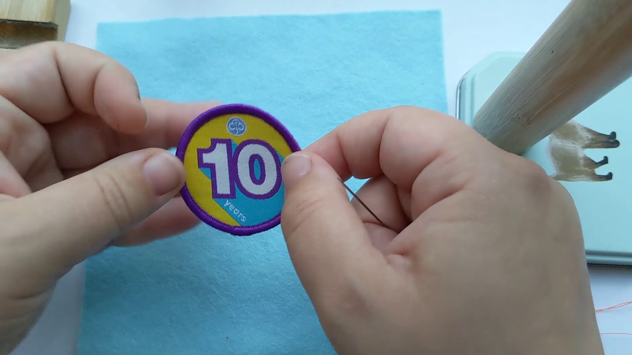 How To Sew On A Badge - YouTube
