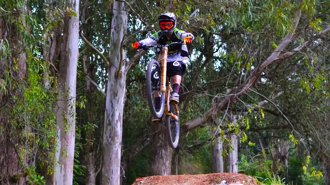 Awesome bamboo bike jumping on the down hill trail. - YouTube