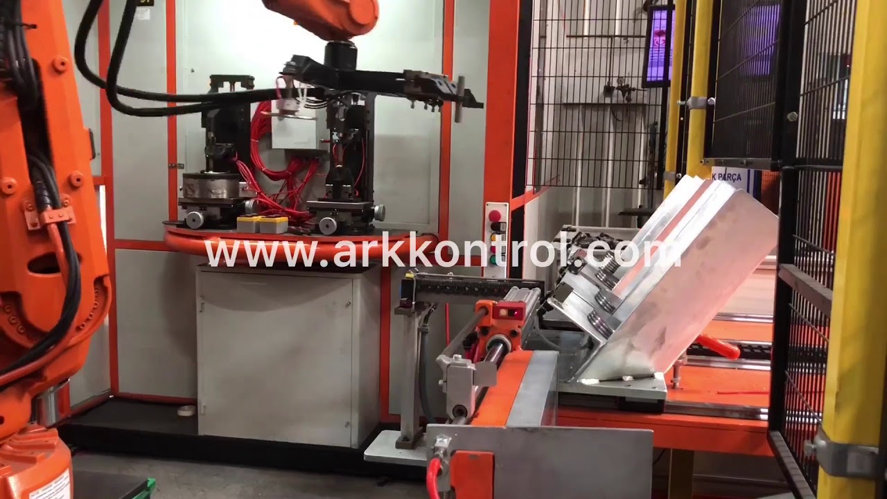 Kaynak robotuna, robot ile parça besleme uygulaması. www.arkkontrol.com ...
