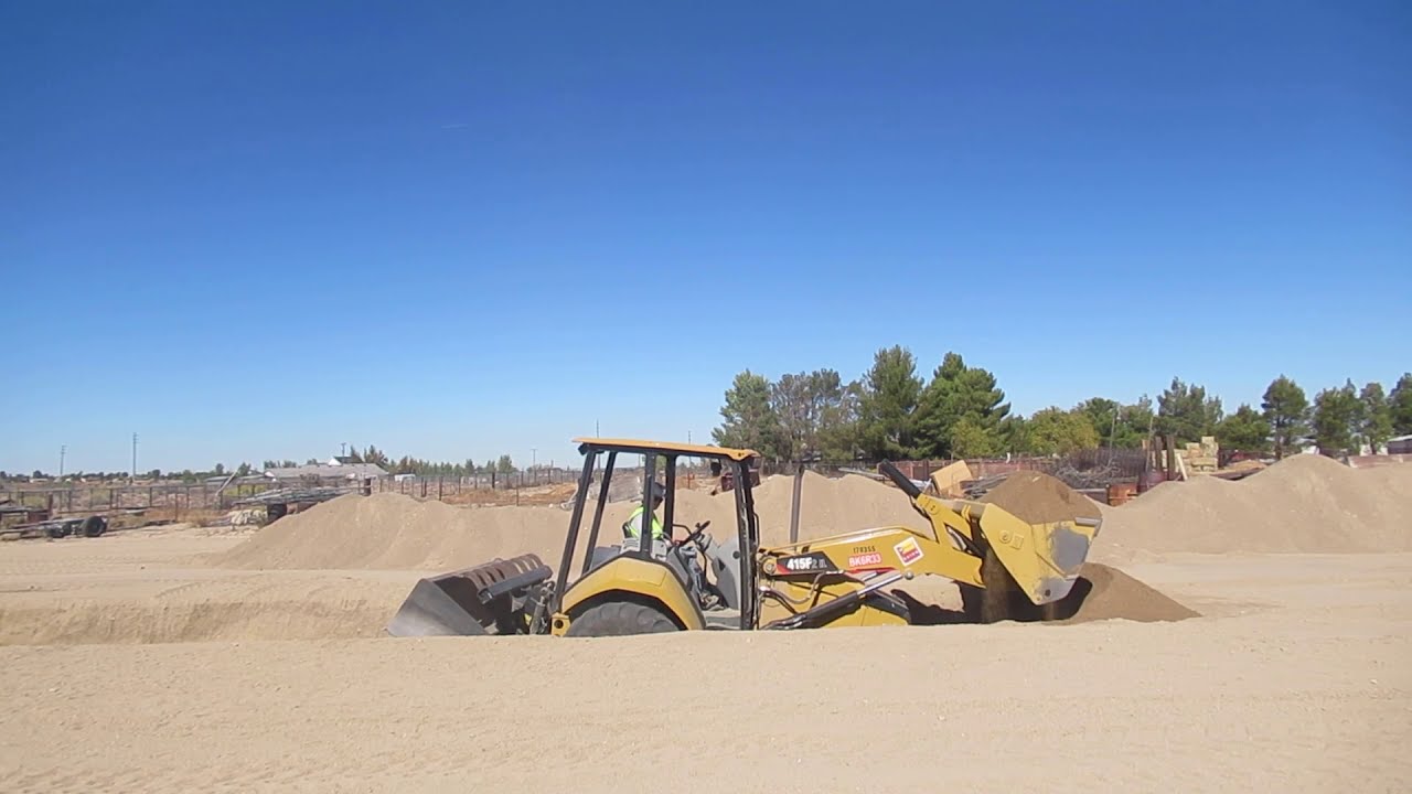 CAT Skip Loader Full Bucket Of Dirt By Operator Justin Hill - YouTube