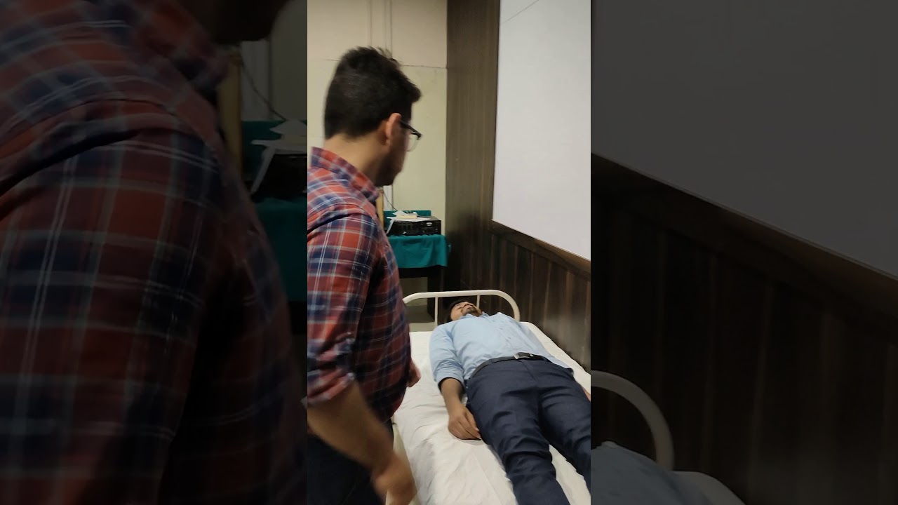 Demonstration of Heel-Knee-Shin Test in a case suffering from ...