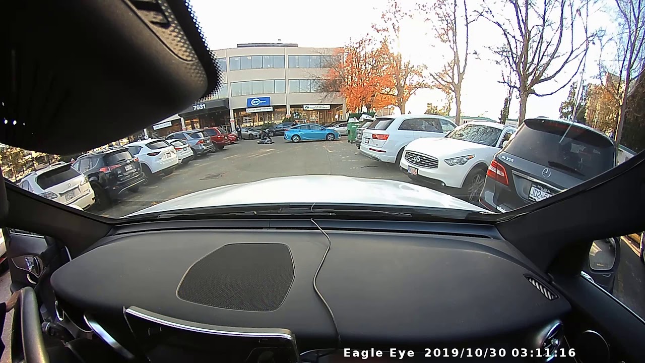 Man gets hit by a car backing up - YouTube