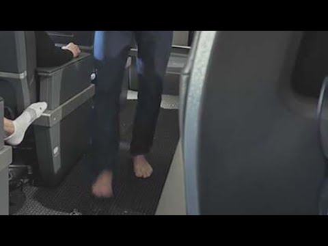 Robert Kennedy Jr. seen barefoot on flight coming from bathroom - YouTube
