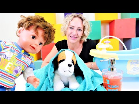 Oyuncak hayvan bakma oyunu. Yağmurda kirlenen köpeğe banyo yaptırıyoruz