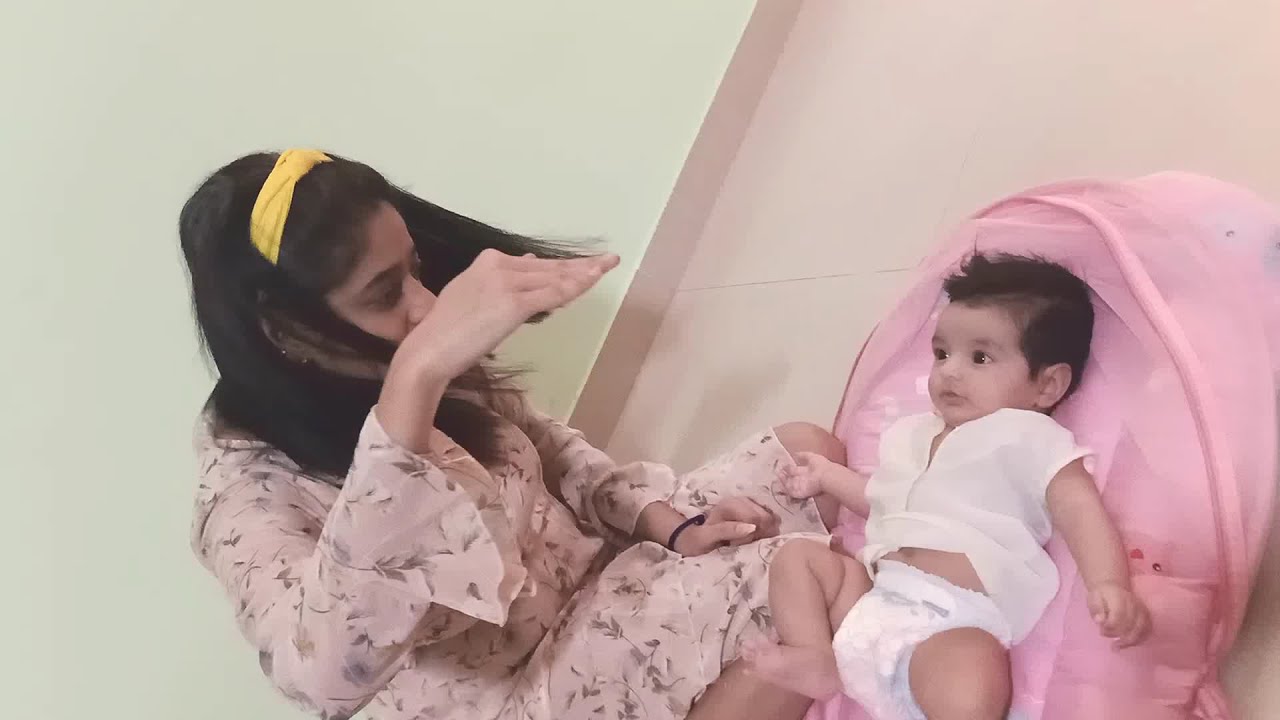 Distracting a new born from crying ! - YouTube