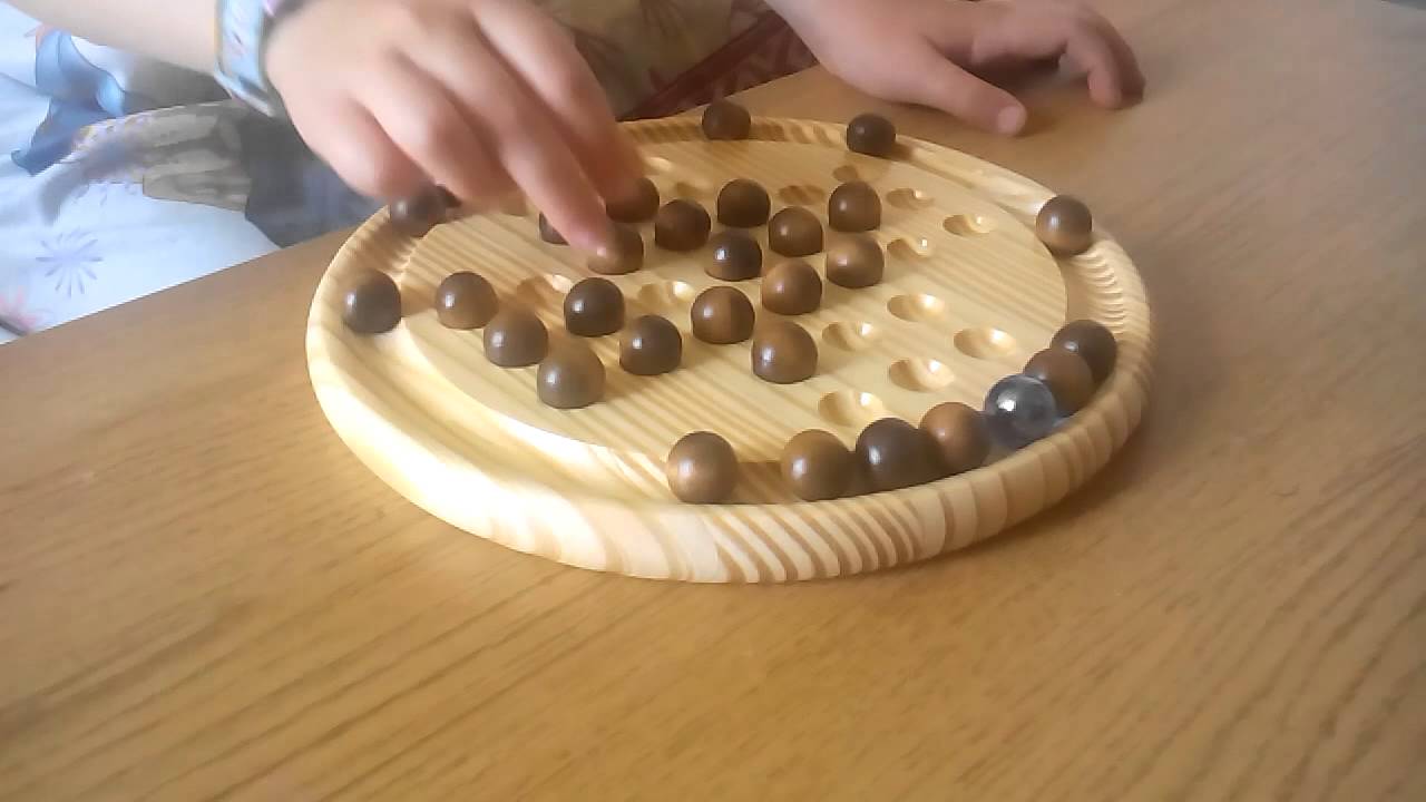 My eight years old daughter shows how to finish the Chinese Solitaire ...