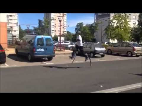 Jump over a car on stilts. - YouTube