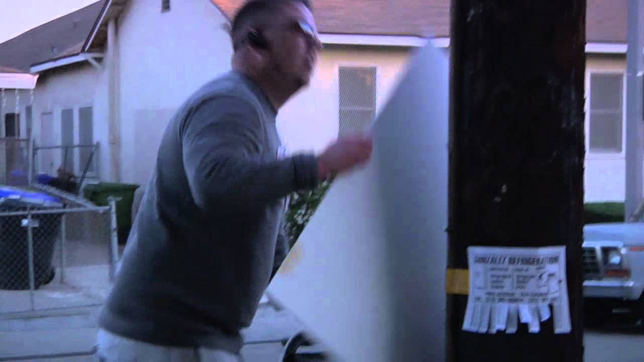 Ed putting up signs with Aidan - YouTube