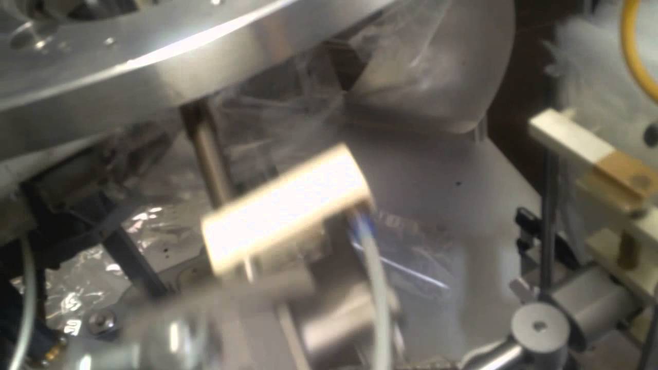Pouch opening at 60 bags/min - YouTube