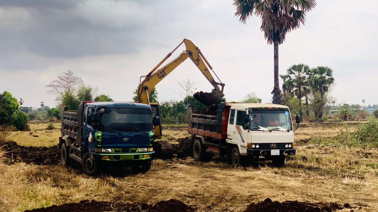 Large earthmoving trucks for construction and development work - YouTube