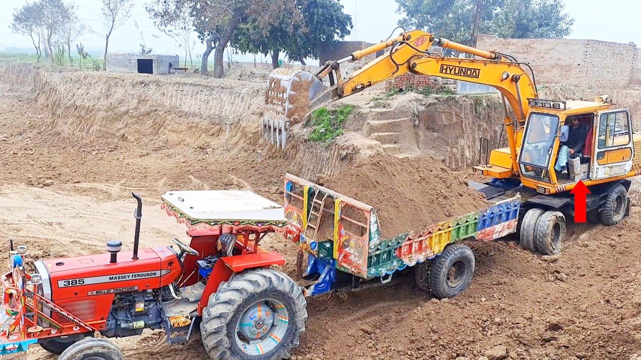 Jcb Hyundai Robex 1300w Loading Mud in Messi Fergusion 385 Tractor with ...