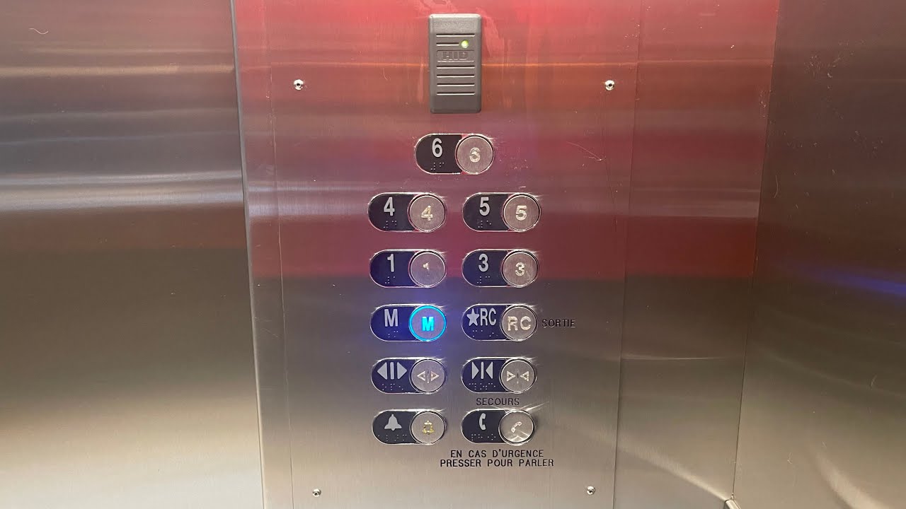 Scenic Northern Traction Elevators at Centre Eaton, Montreal, QC - YouTube