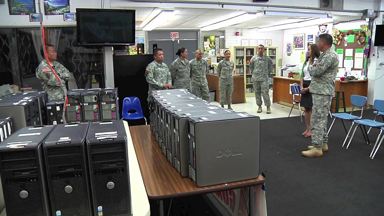 Guam Guard donates computers to school library - YouTube