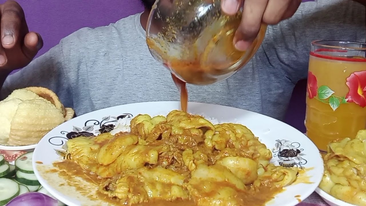 Mutton fat with extra gravy, white rice, salad, pepper and juice eating ...