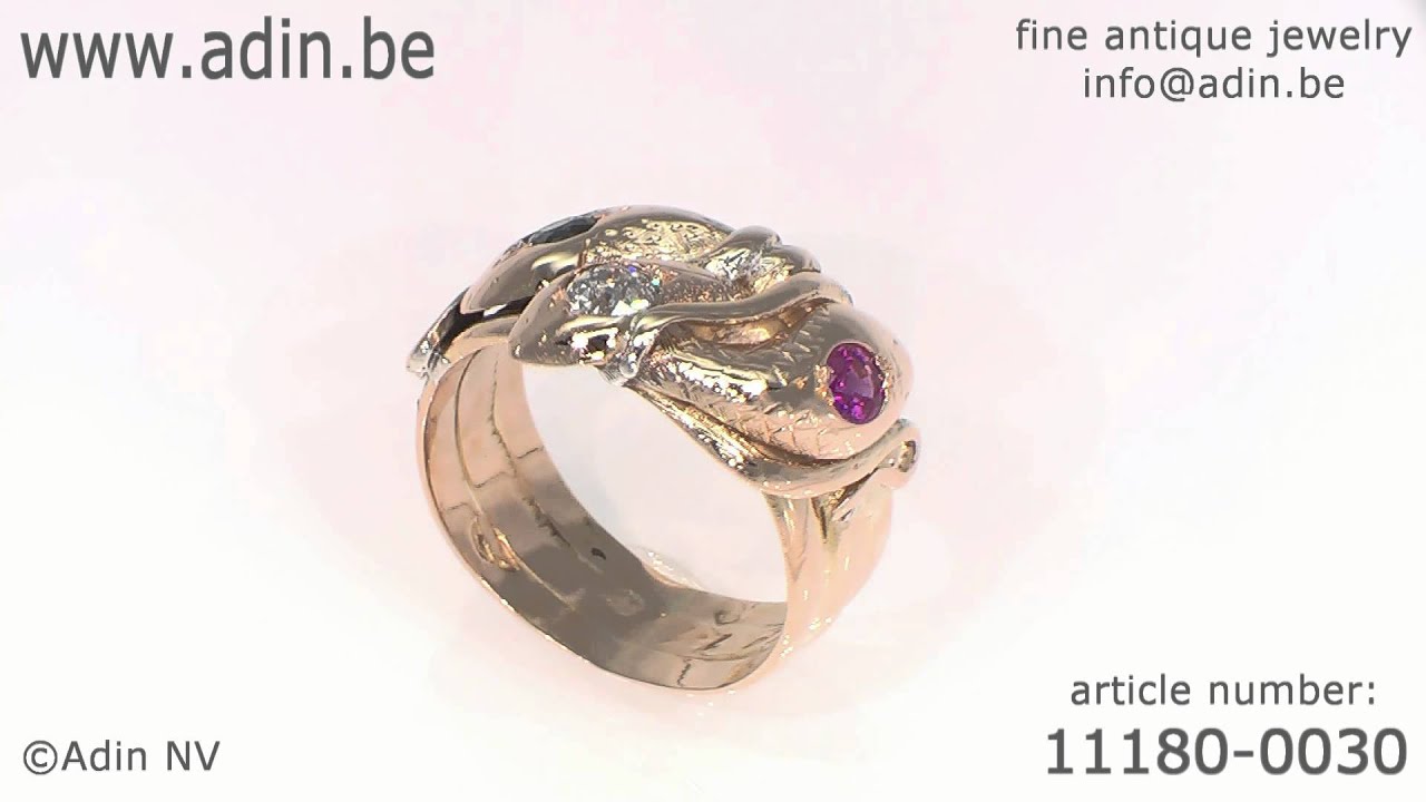 Gold snake ring with three entangled serpents with ruby, sapphire and ...
