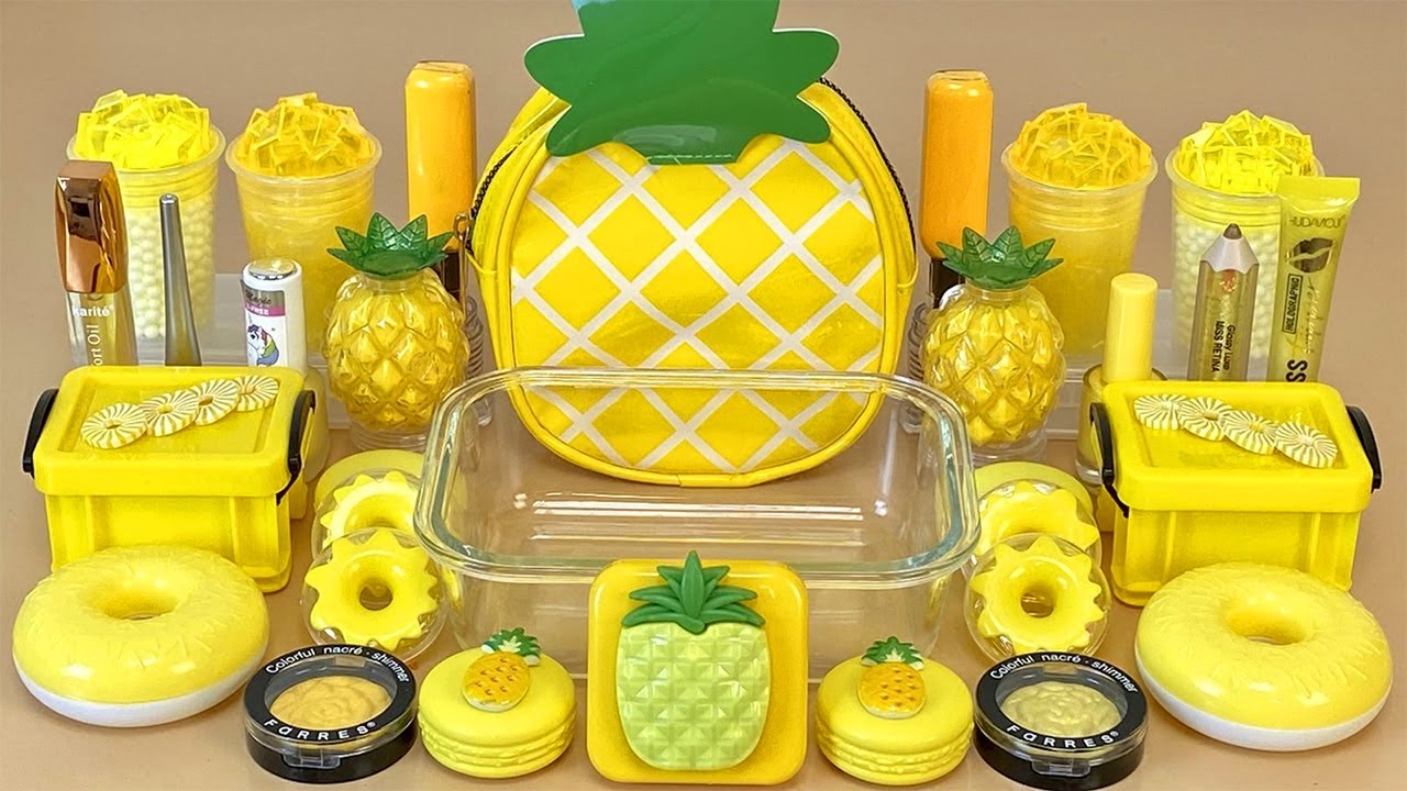 PINEAPPLE SLIME 🍍💛 Mixing makeup and glitter into Clear Slime 💯% ASMR ...