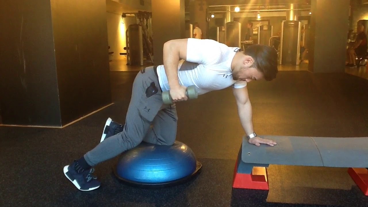 Dumbbell Triceps kickback hand on step knee on bosu - YouTube
