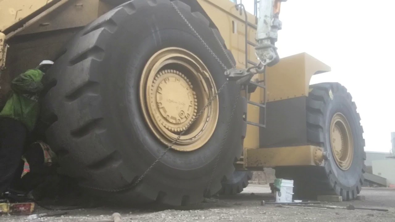 Frist time changing a 45/65R39 on a wheel loader - YouTube