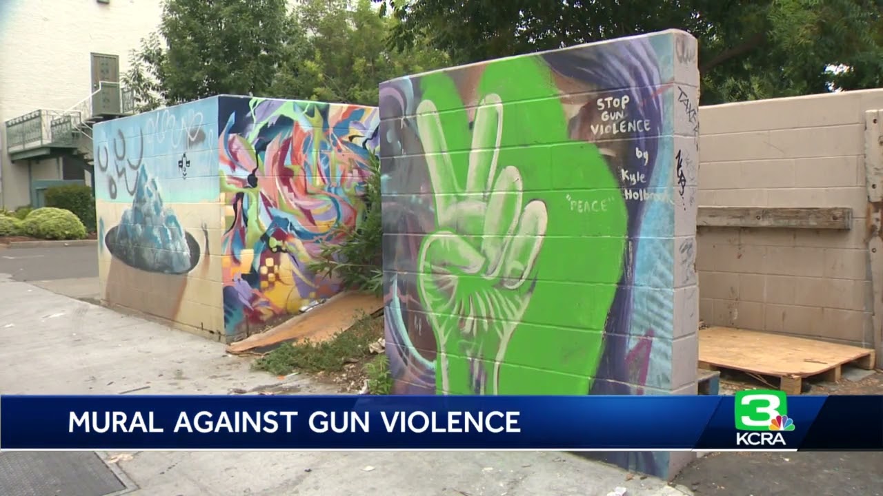 Gun violence mural added to Sacramento city walls - YouTube