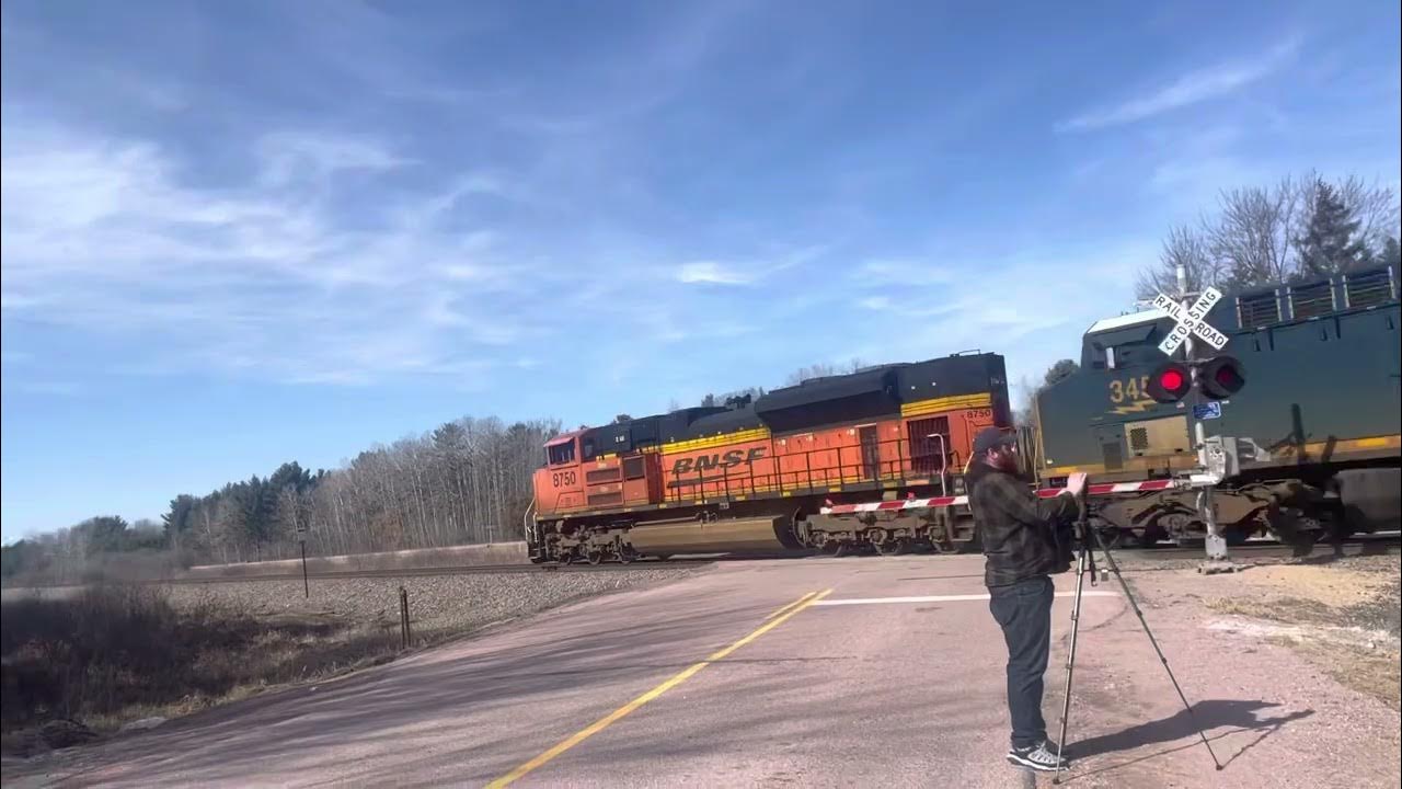 BNSF 8750 SD70ACE leads CN A491. Trailing Units CSX 345 & CN 5435 SD60. - YouTube