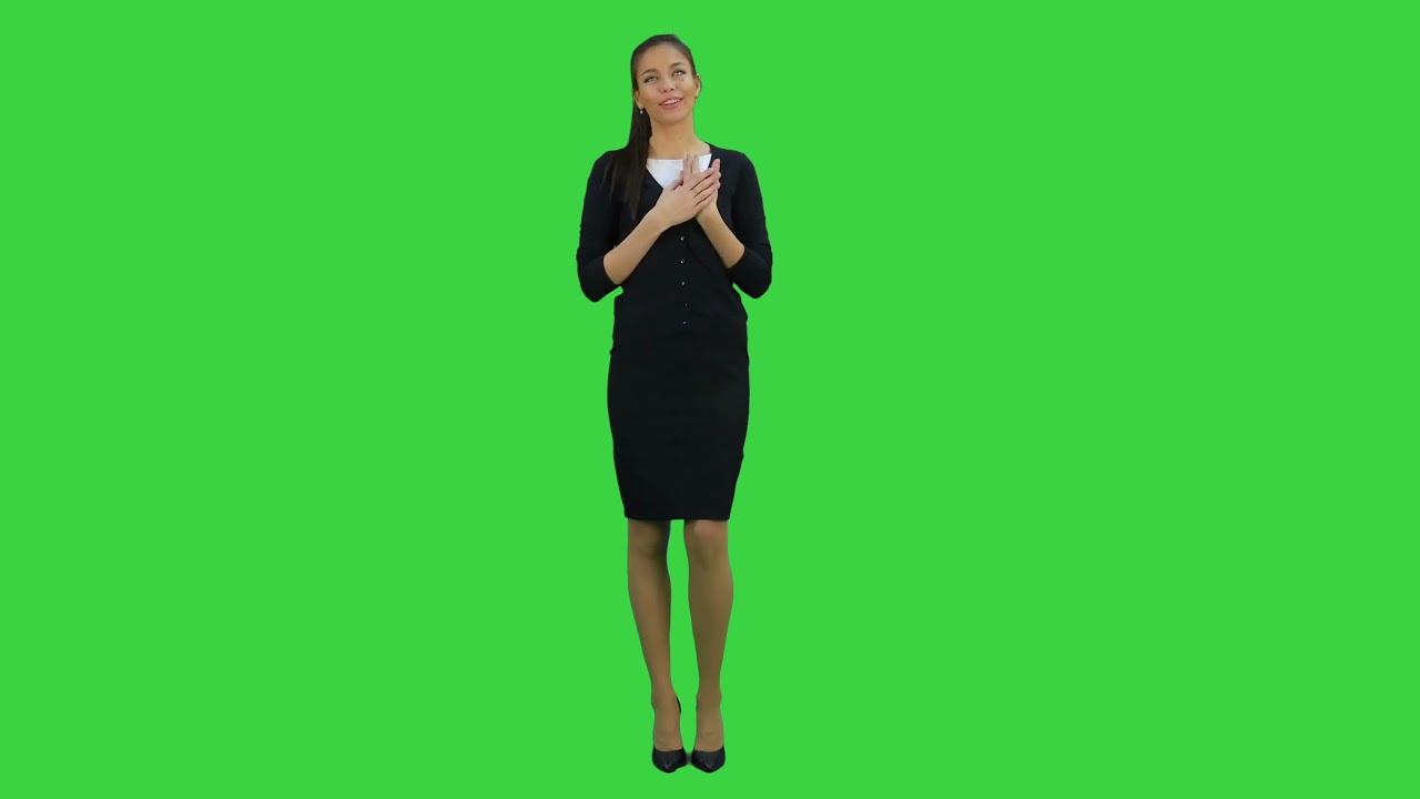 Green Screen | Chroma Key | smiling young woman in formal wear talking ...