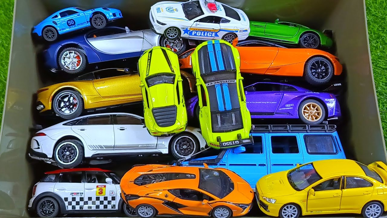 Box Full of Model Cars BMW E30 M3, Lamborghini Svj, Lamborghini Veneno ...