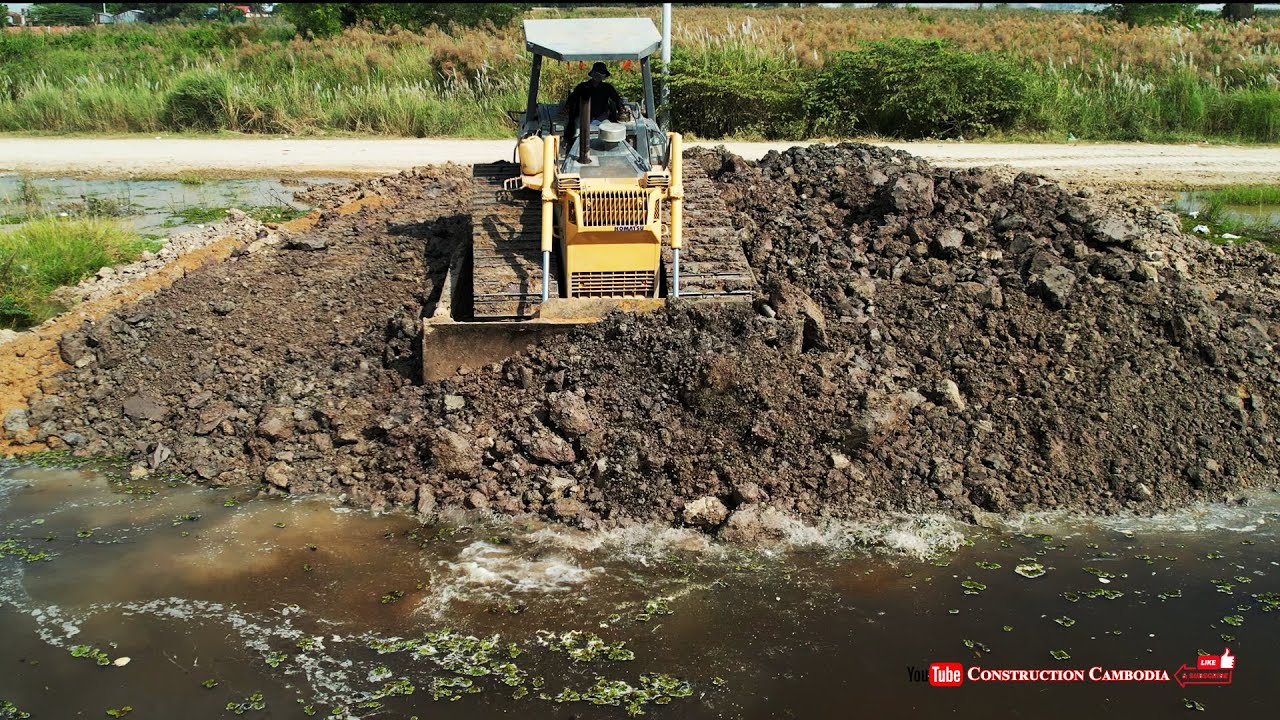 New Filling Land Up Into Water By Heavy Machinery Dozer Komatsu D65Px ...