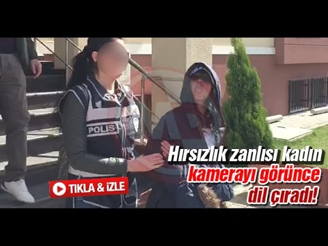 Hırsızlık zanlısı kadın kamerayı görünce dil çıkardı