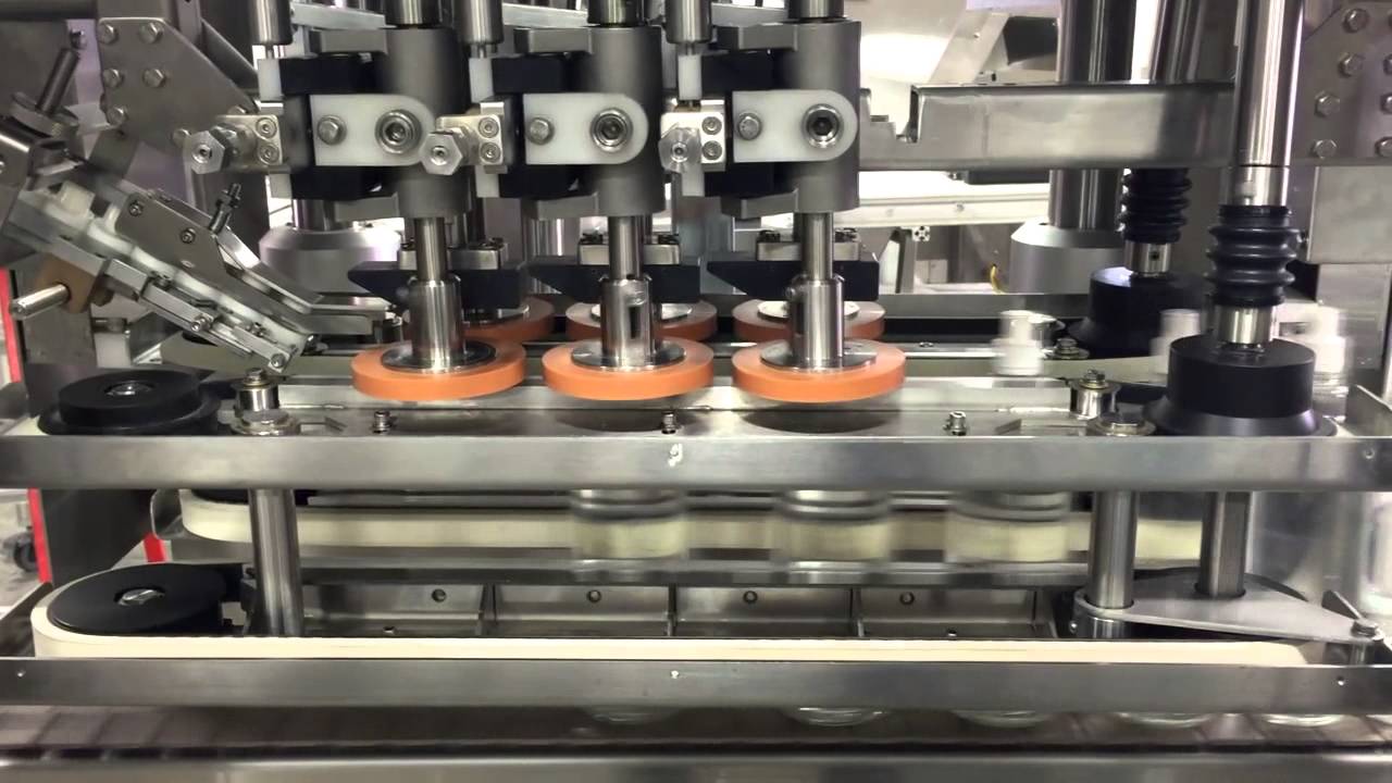 Automatic inline capper model TruCap 6, manufactured by Acasi Machinery - YouTube