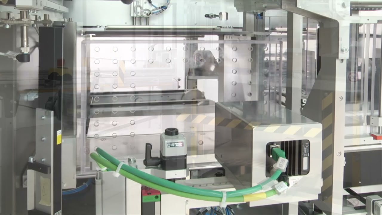 Workflow case packer Romaco Promatic PAK 320 - YouTube